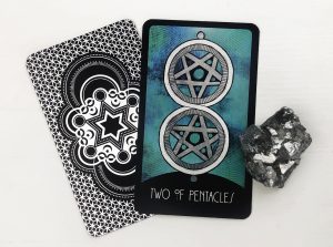 The Two of Pentacles Tarot Card - Keen Articles