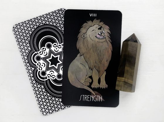 The Strength Tarot Card - Keen Articles