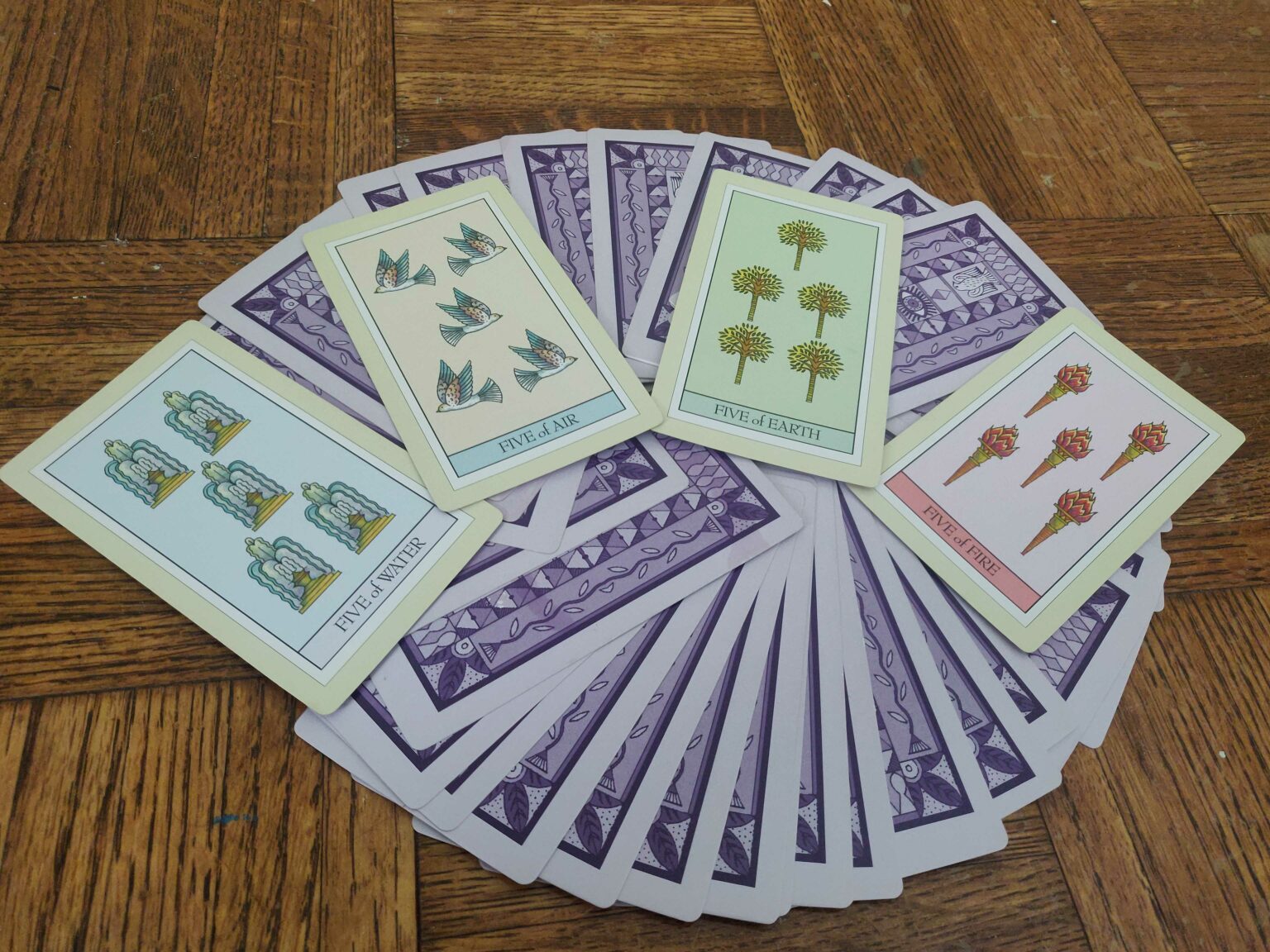 The Meaning of Fives in Tarot Cards | Keen